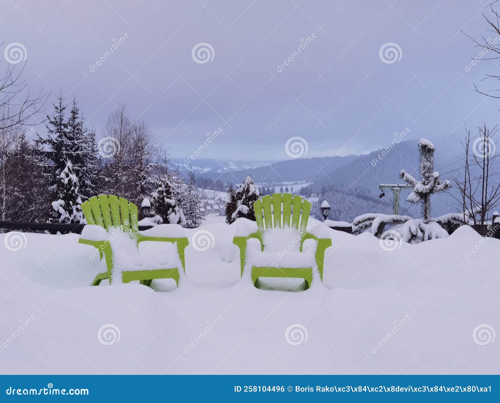 Snow covered chairs stock photo. Image of tree, blizzard - 258104496