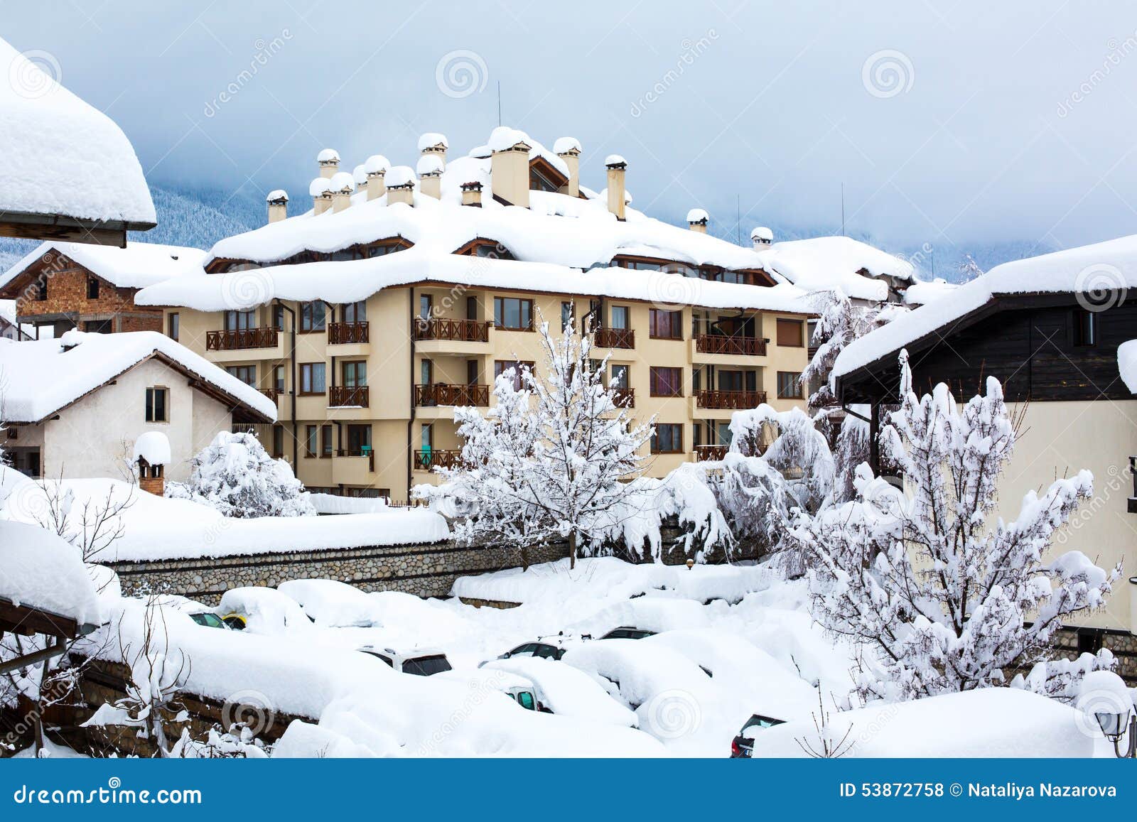Snow Covered Chalets after the Hard Snowfall Stock Photo - Image of ...