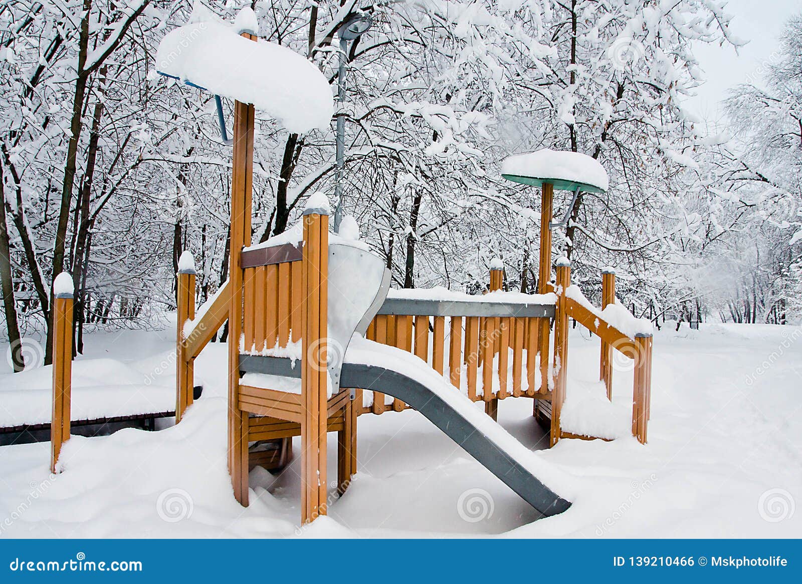 Snow Covered Childrens Slide in the Park Stock Photo - Image of relax ...