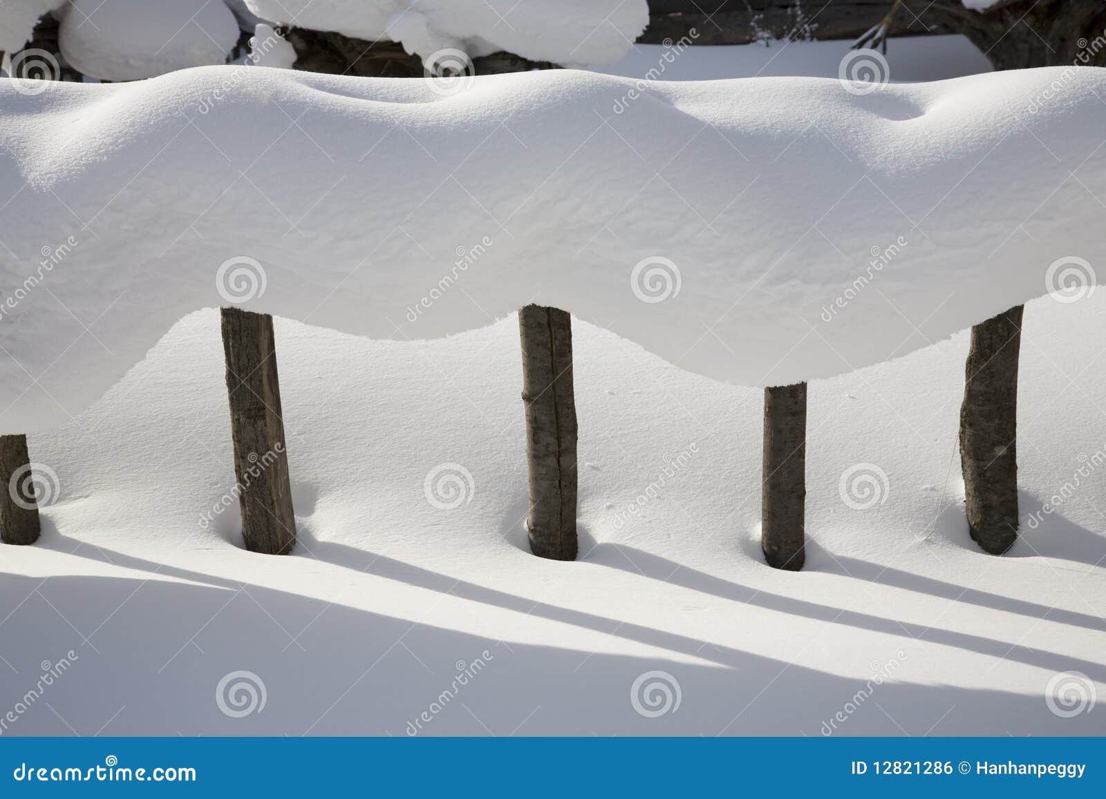 Snow-covered fence stock photo. Image of winter, snow - 12821286