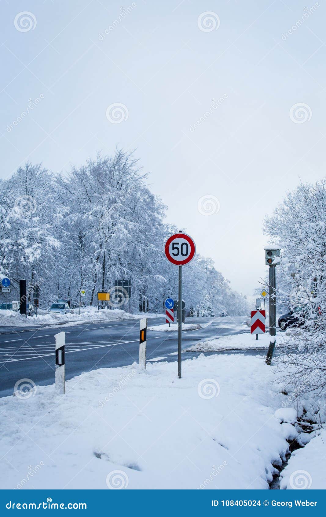 Snow-covered intersection stock photo. Image of road - 108405024