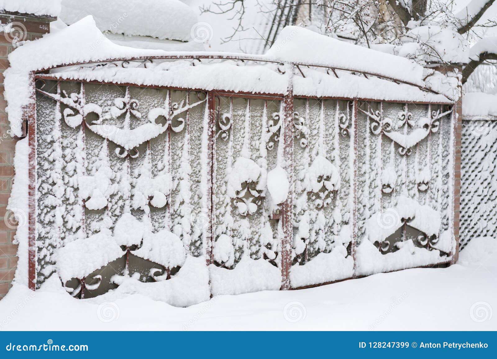 Snow-covered Iron Gates. Winter Wrought Fence Gates Stock Image - Image ...