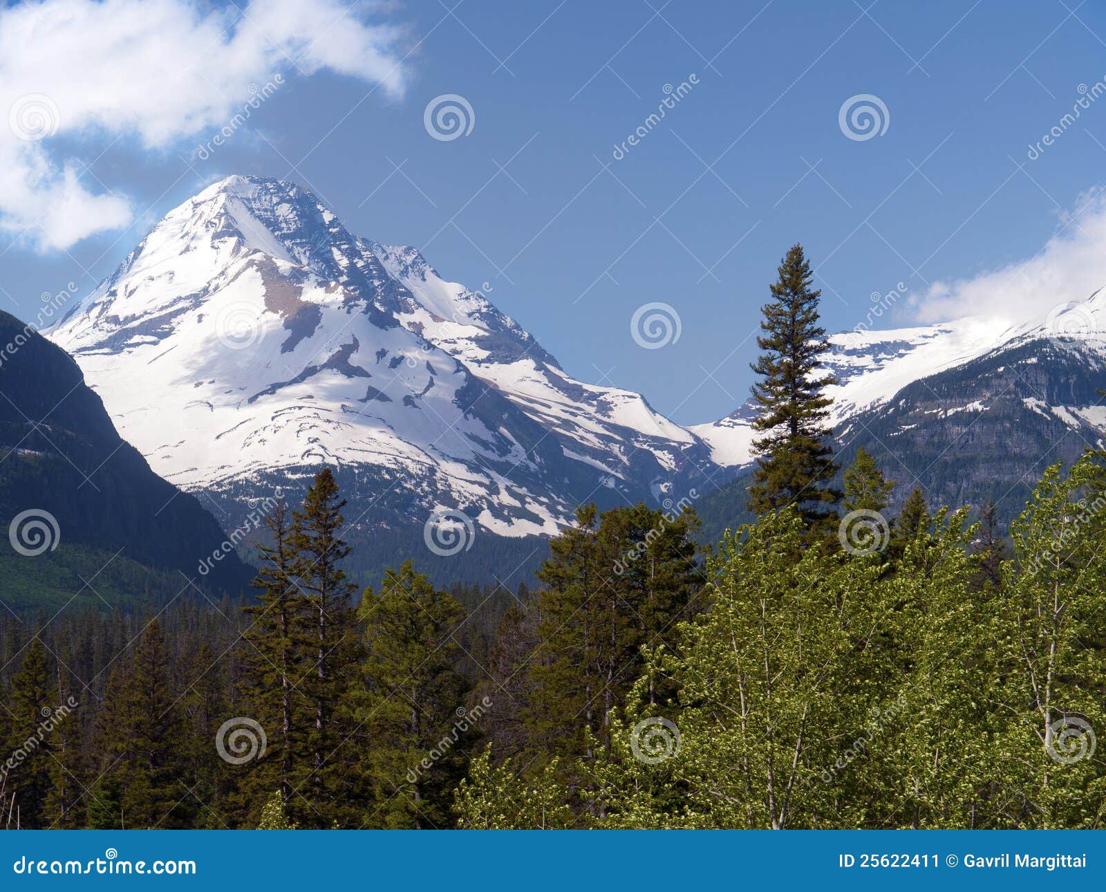 Snow covered mountain peak stock image. Image of park - 25622411