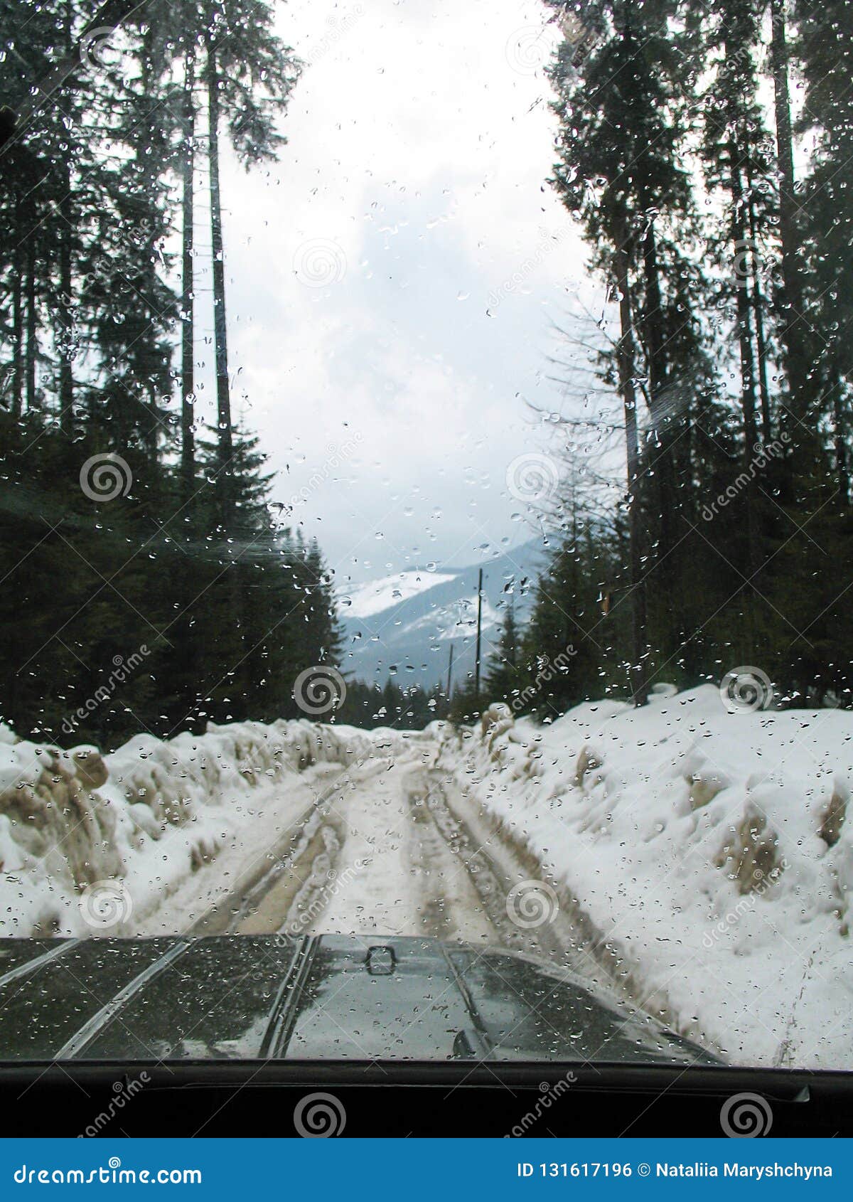 Snow-covered Mountain Road. View from the Car Window Stock Photo ...