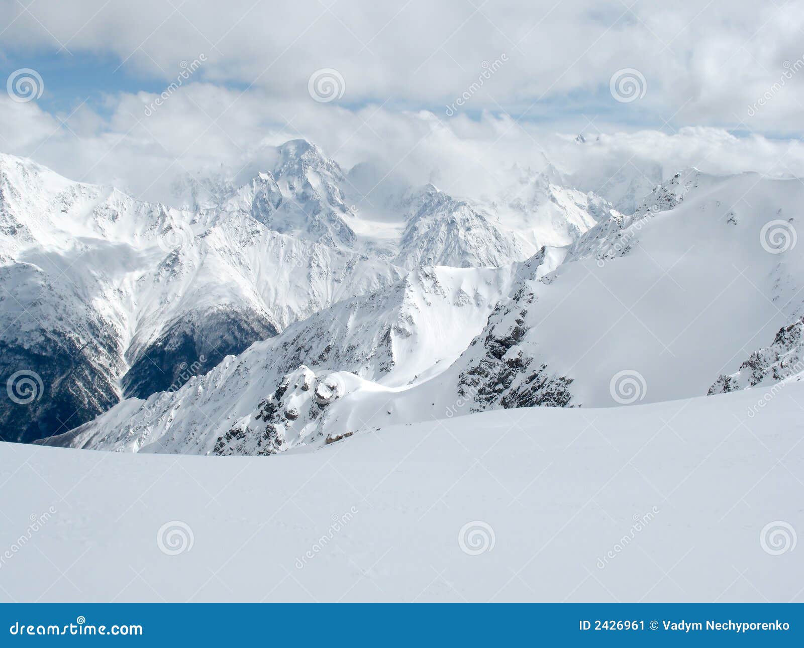 Snow covered mountains stock image. Image of blue, natural - 2426961