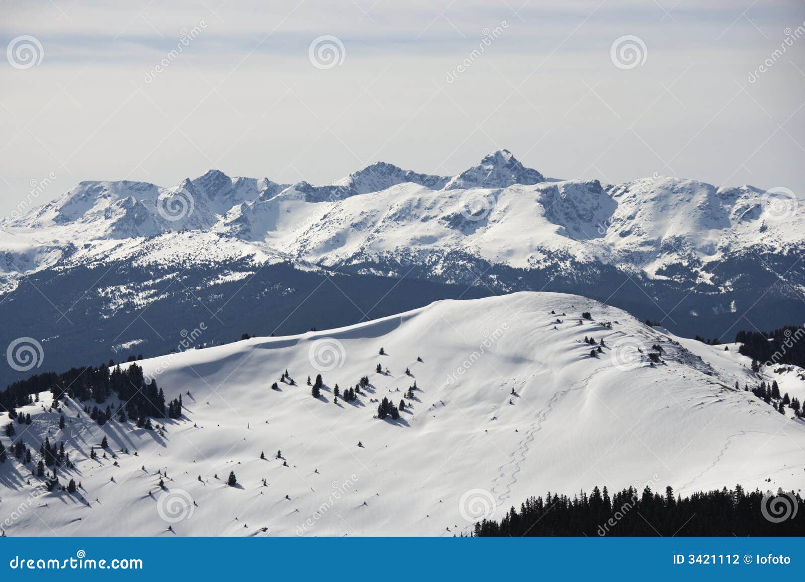 Snow covered mountains. stock photo. Image of secluded - 3421112