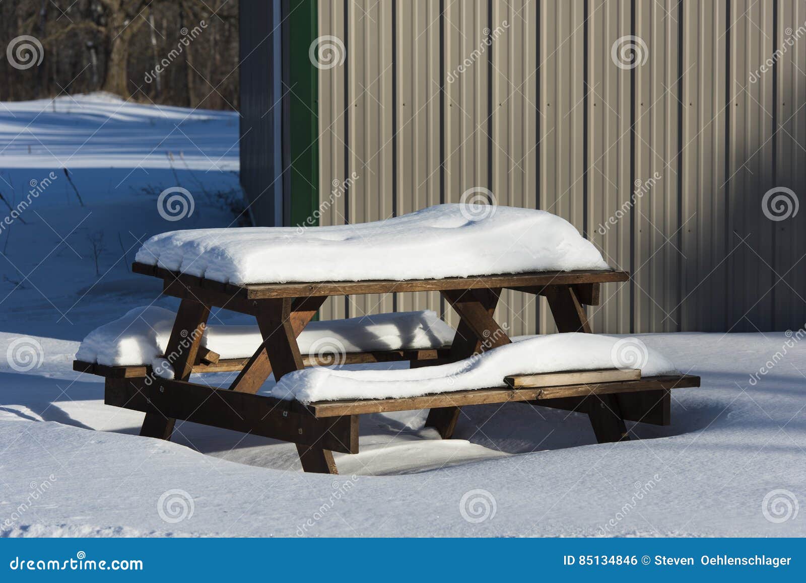 Snow covered Picnic Table stock photo. Image of table - 85134846
