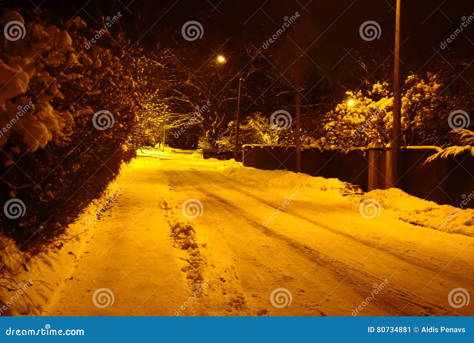 Snow covered road at night stock image. Image of freezing - 80734881