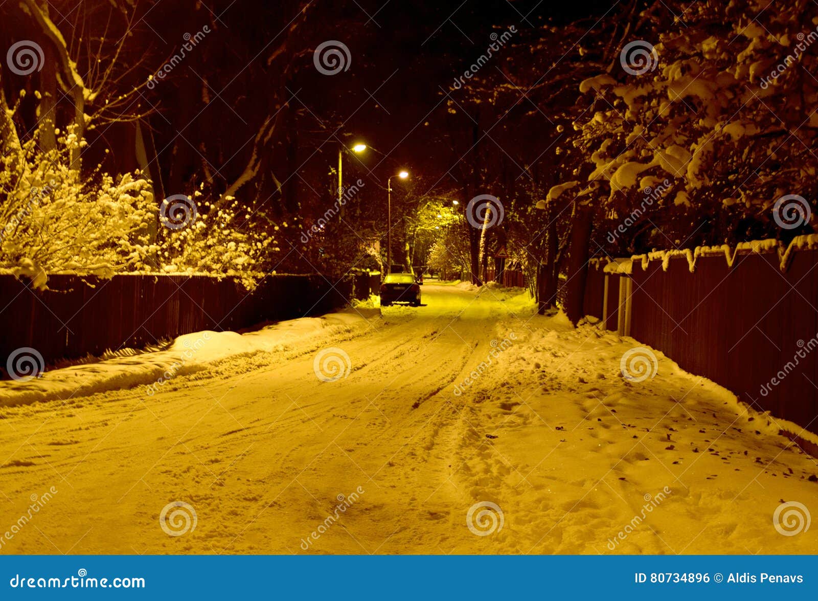 Snow covered road at night stock photo. Image of frozen - 80734896