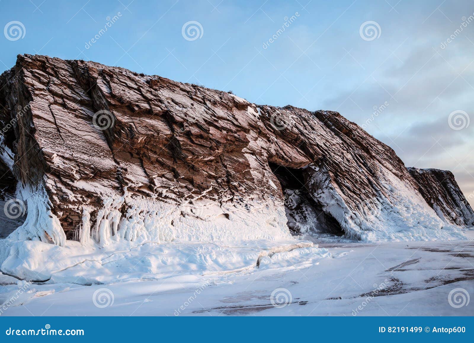 Snow-covered Rock with Grotto Stock Image - Image of landscape, block ...