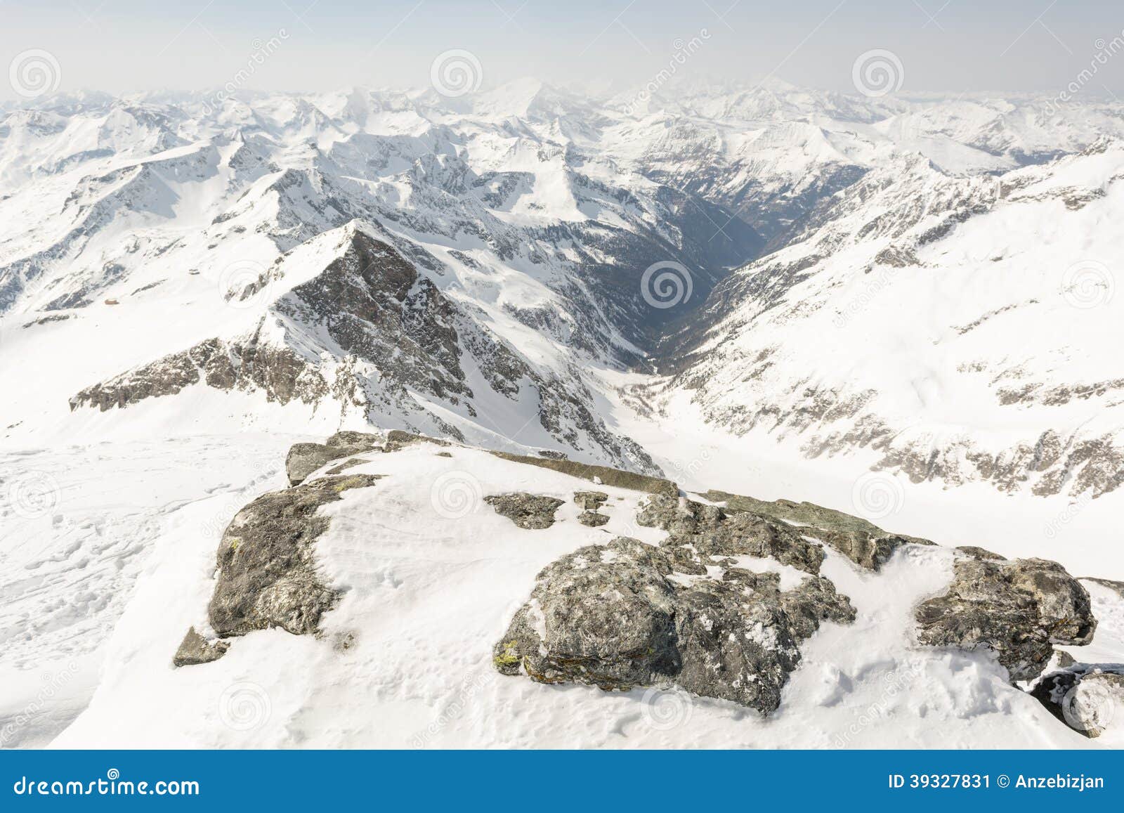Snow Covered Rock with a Mountain Valley Stock Image - Image of ...