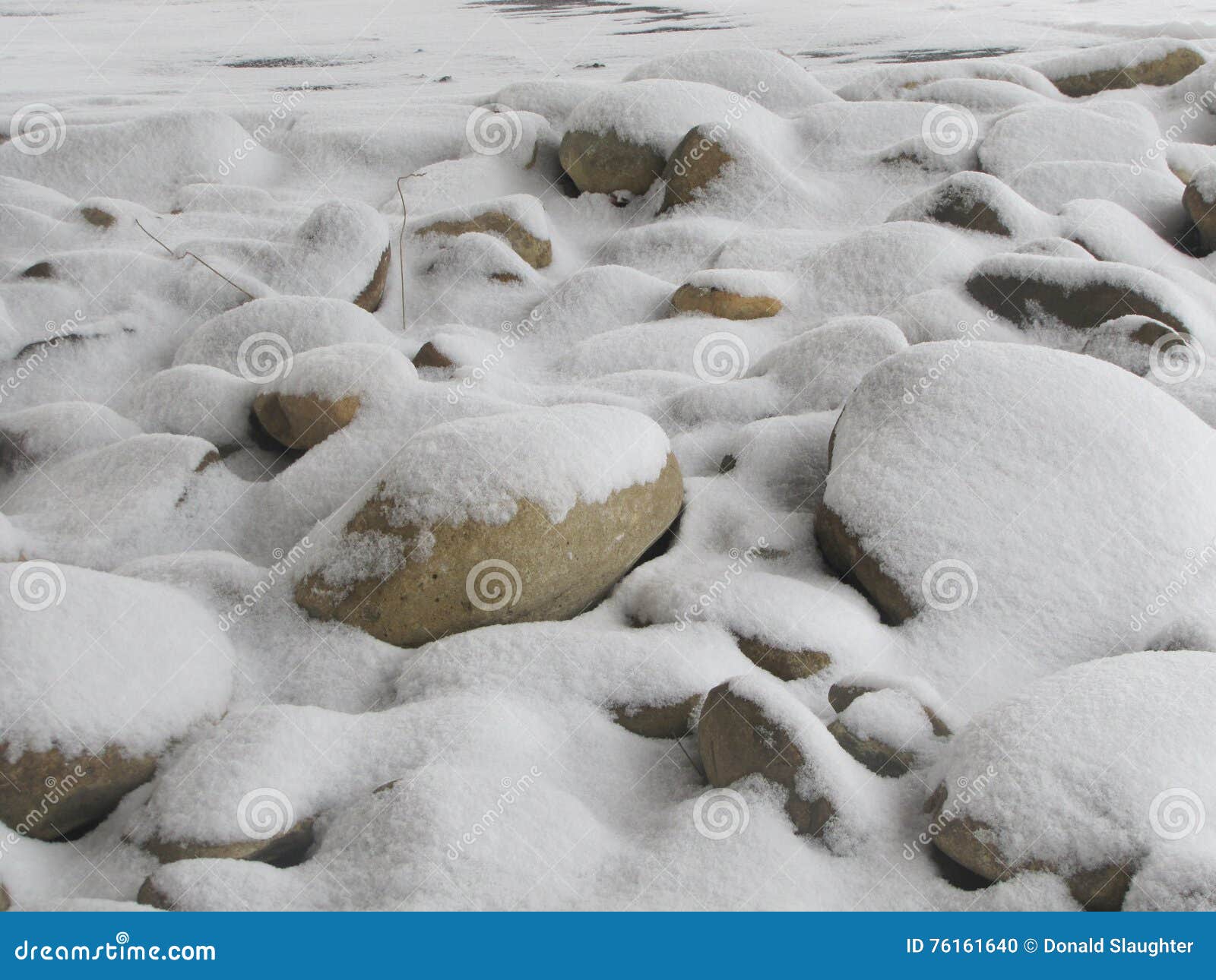 Snow-covered Rocks Beneath Freeway Stock Photo - Image of ...