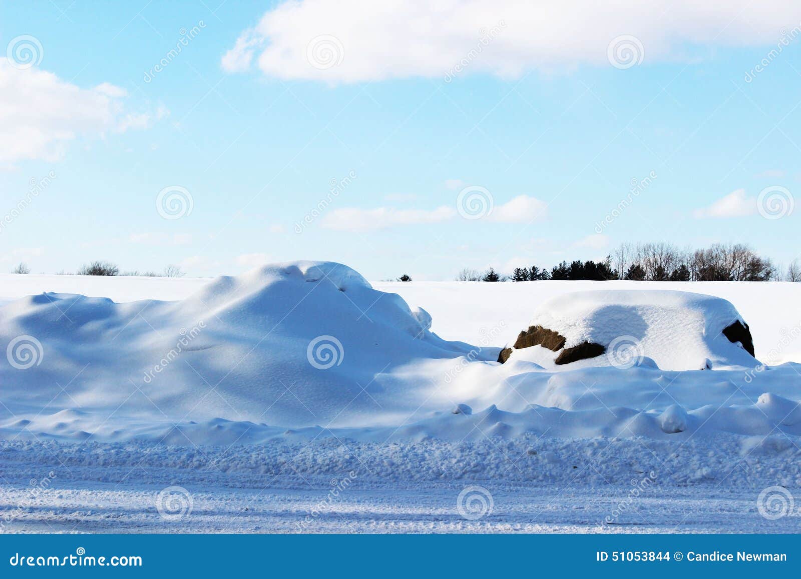 Snow Covered Rocks by a Country Road Stock Photo - Image of white ...