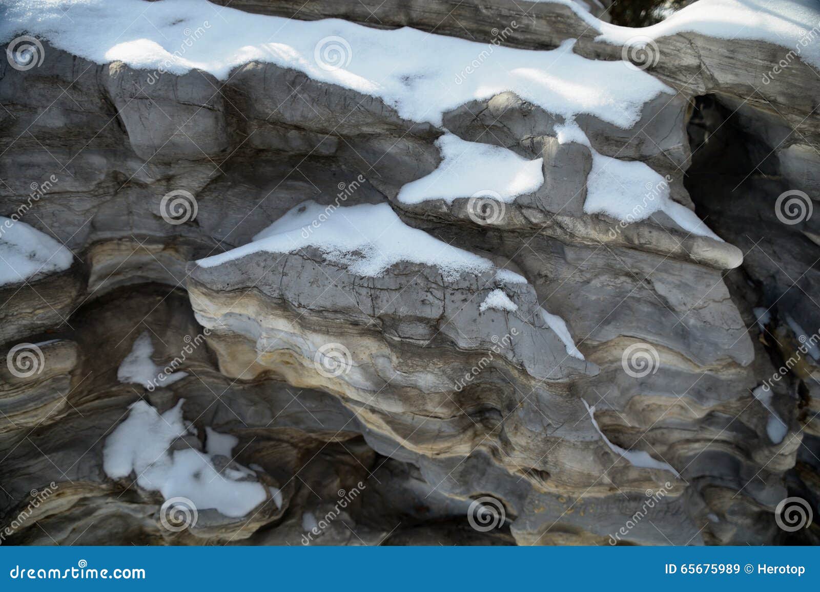 The snow covered rocks stock image. Image of sunshine - 65675989