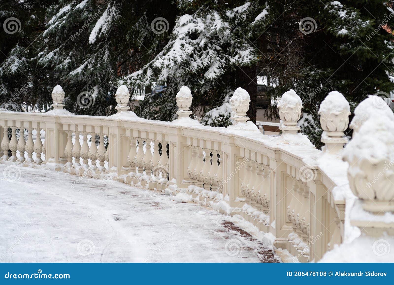 Snow Covered Round Veranda with White Stone Balusters Stock Photo ...