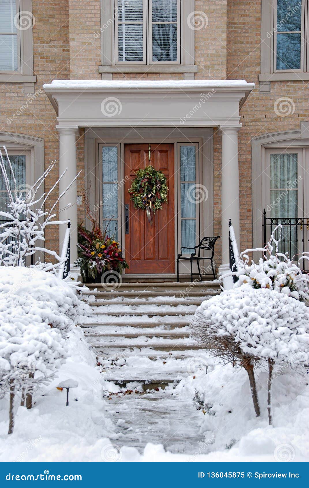 Snow covered shrubbery stock image. Image of portico - 136045875
