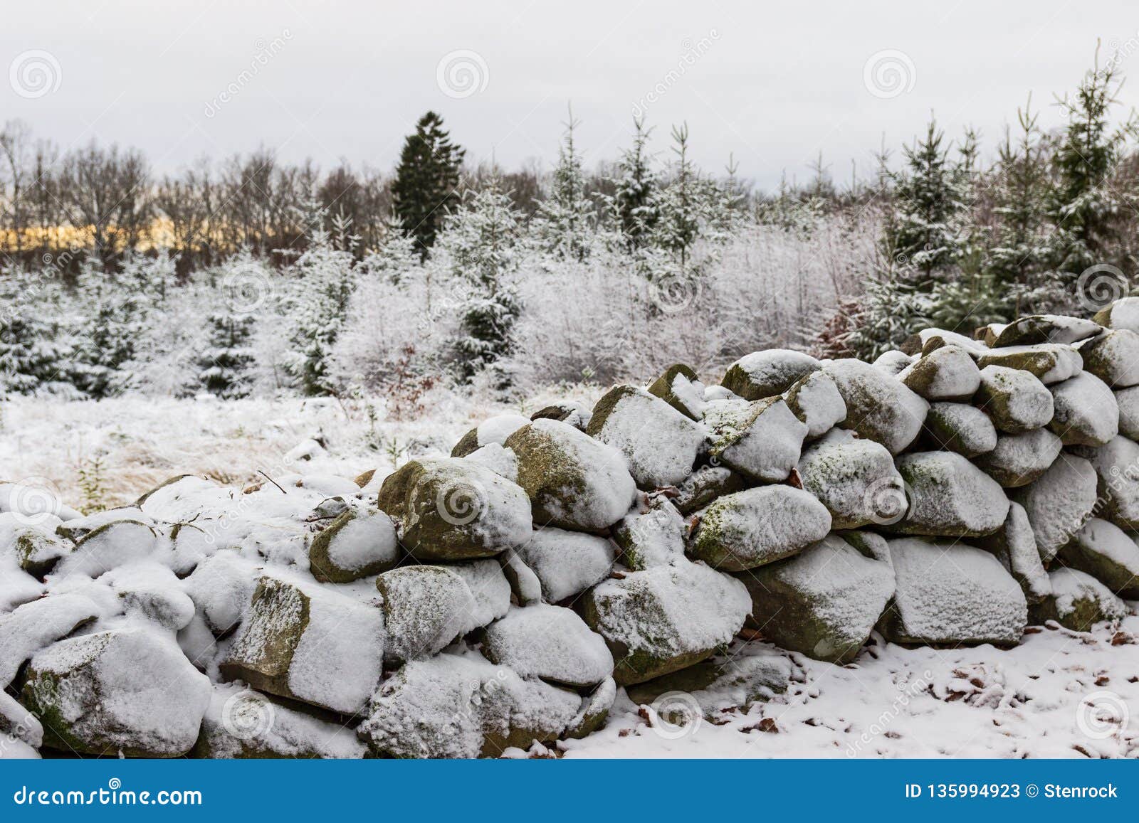 Snow covered stone wall stock image. Image of sweden - 135994923