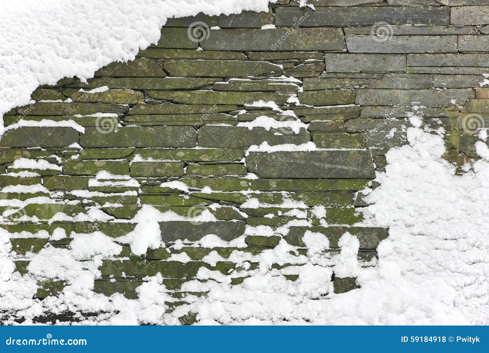 Snow-covered stone wall stock photo. Image of backdrop - 59184918