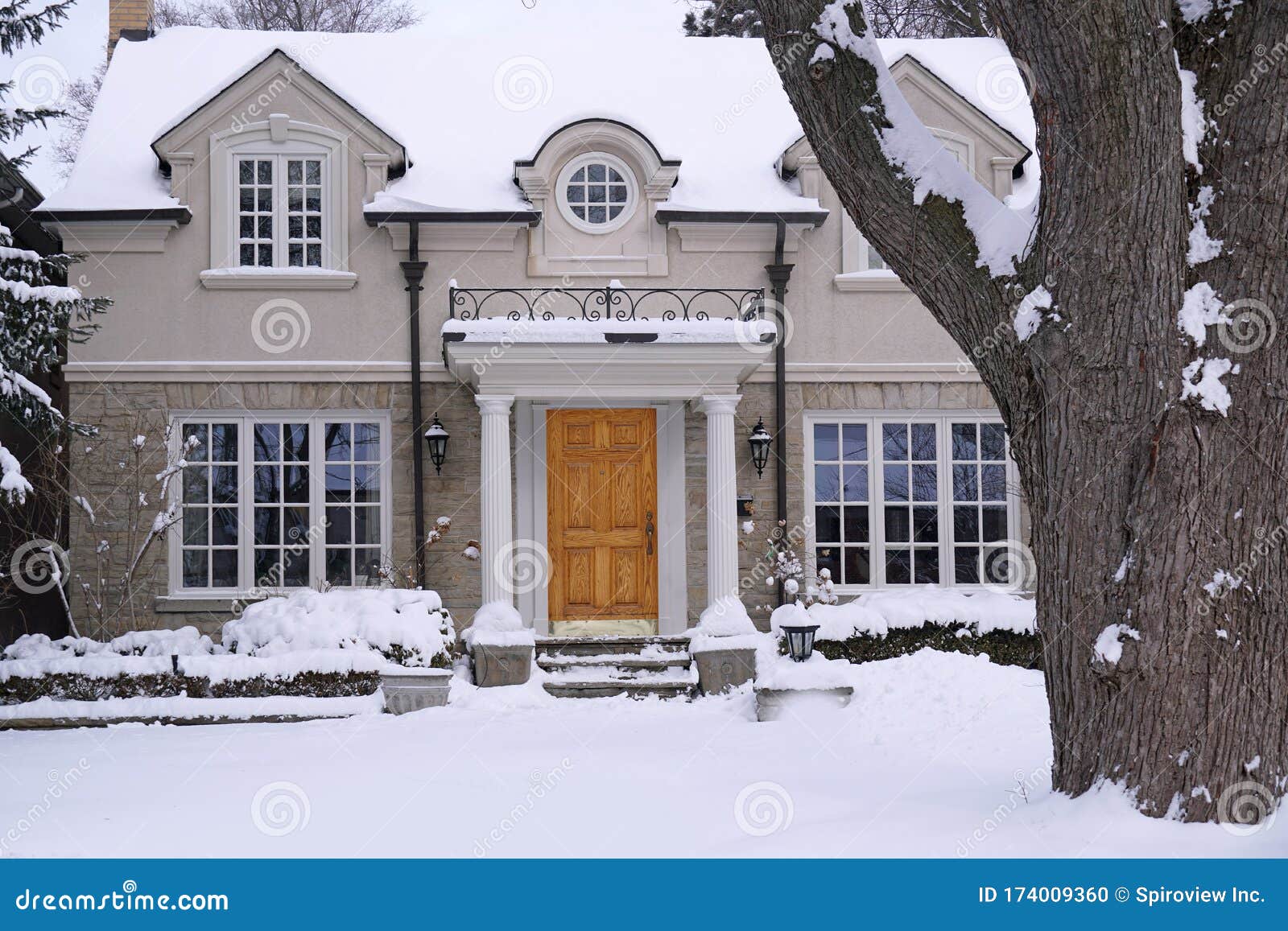Snow Covered Stucco and Stone House Stock Photo - Image of snow, stone ...