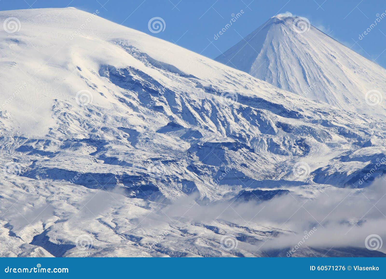 The Snow-covered Top of a Volcano Stock Photo - Image of transcendental ...