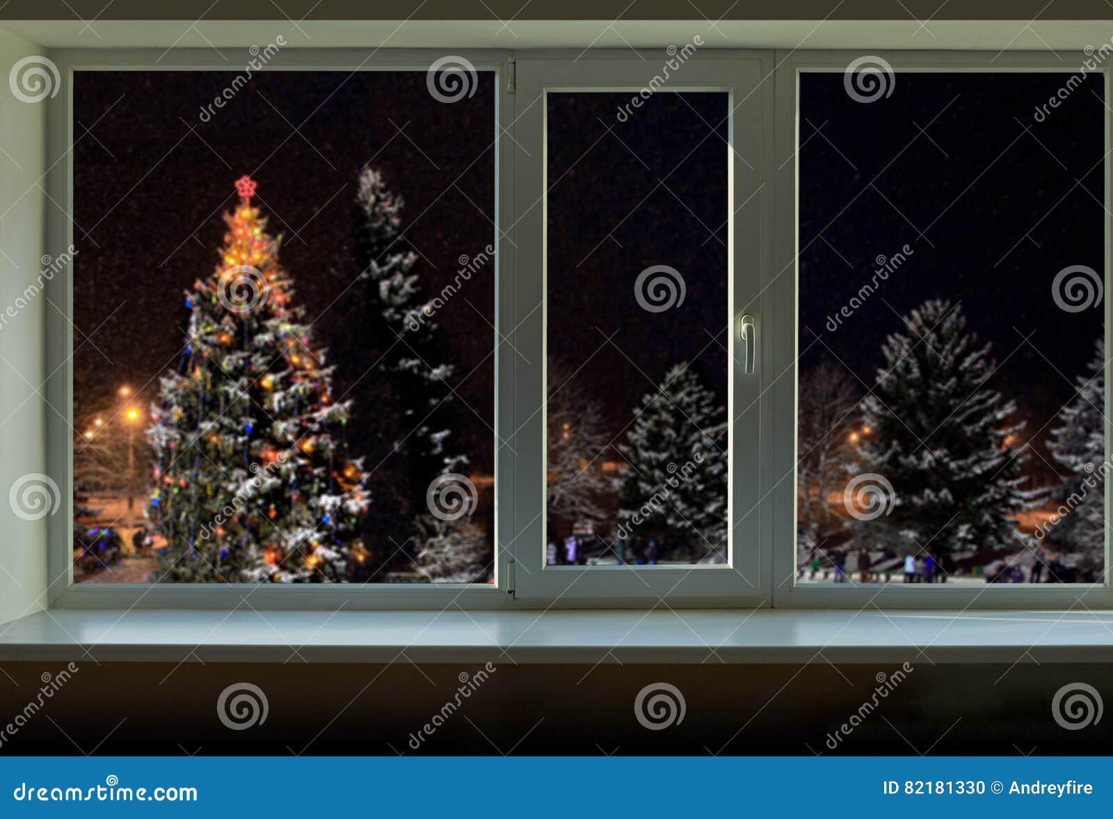 Snow-covered Trees Near the Christmas Tree Outside the Window Stock ...