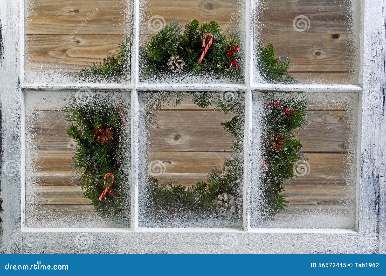 Snow Covered Window with Decorative Christmas Wreath on Window Stock ...