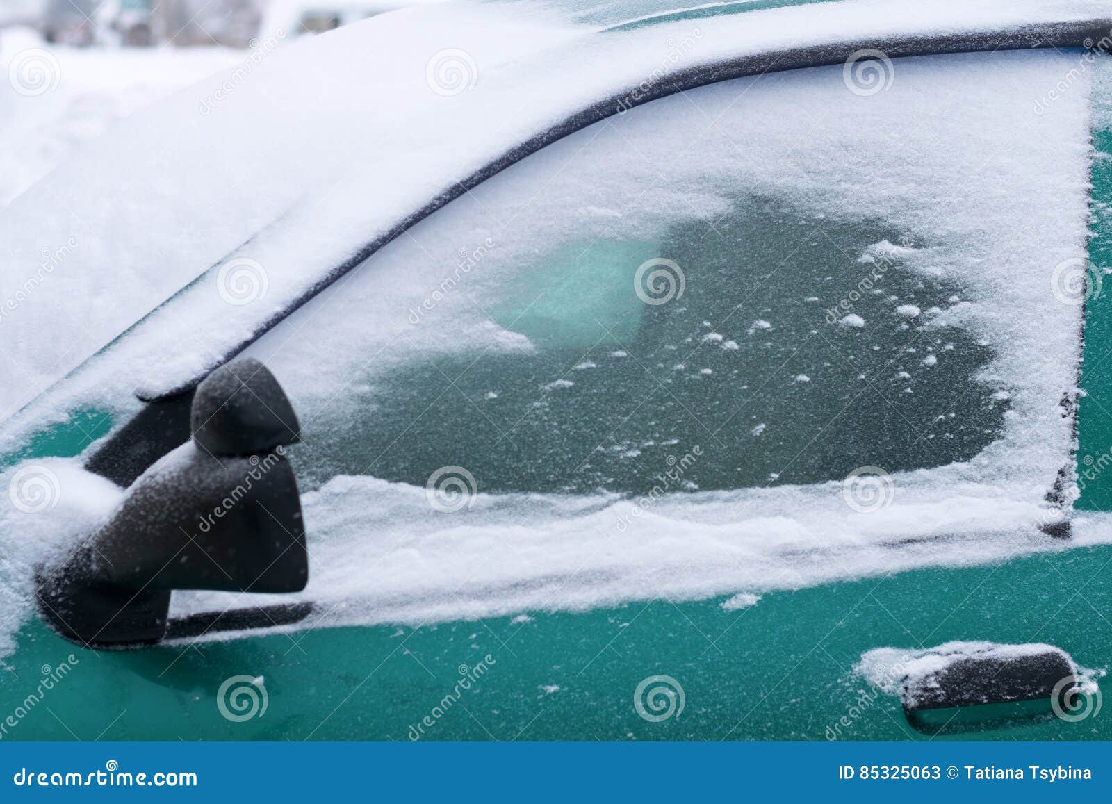 Snow-covered Windshield and the Side Window of the Car in a Snowstorm ...