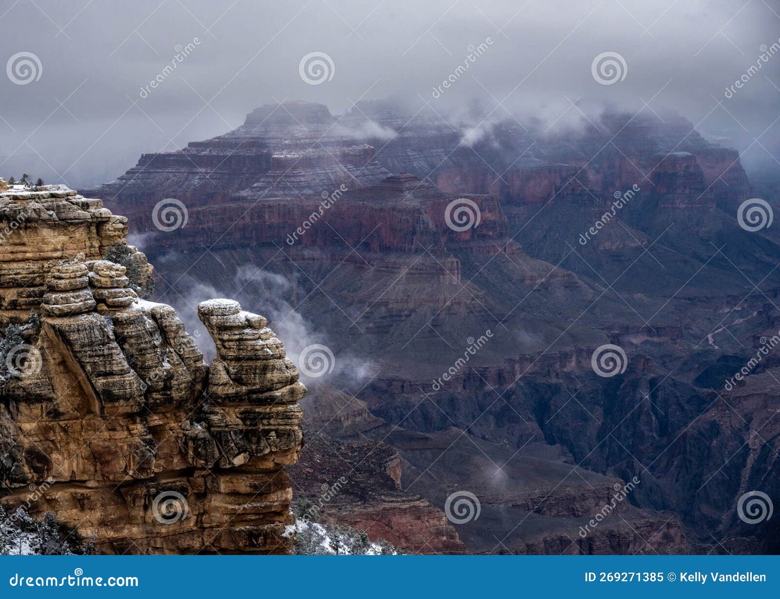 Snow Covers the Top of Grand Canyon As Clouds Float by Stock Image ...