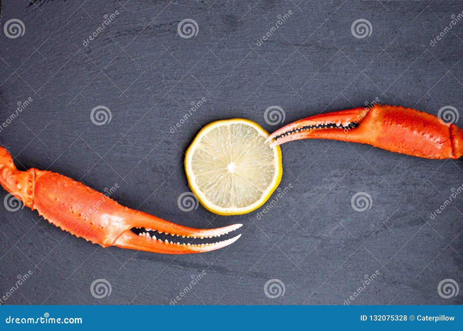 Snow Crab Claw with Lemon on a Table. Selective Focus Stock Photo ...
