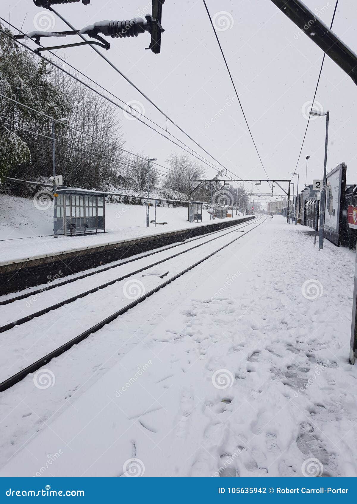 Snow fall on train tracks editorial photography. Image of covered ...