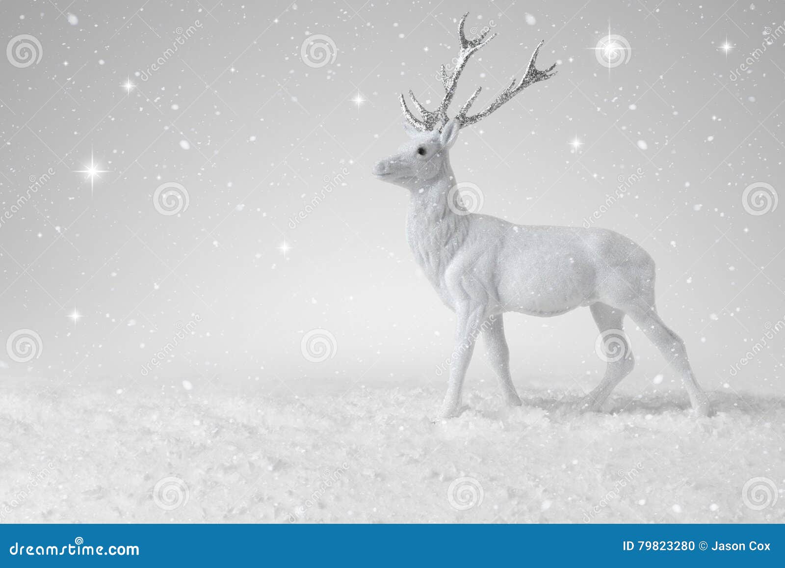 Snow Falling on a Christmas Reindeer Stock Photo - Image of traditional ...