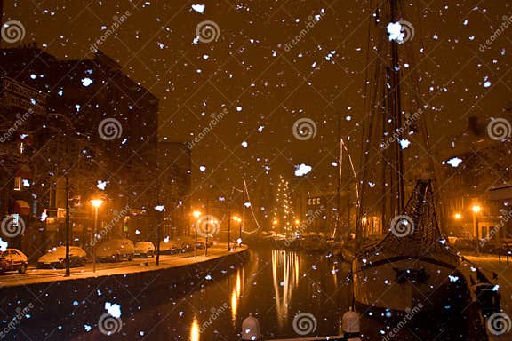 Snow Falling in the City Groningen Stock Photo - Image of water, tree ...