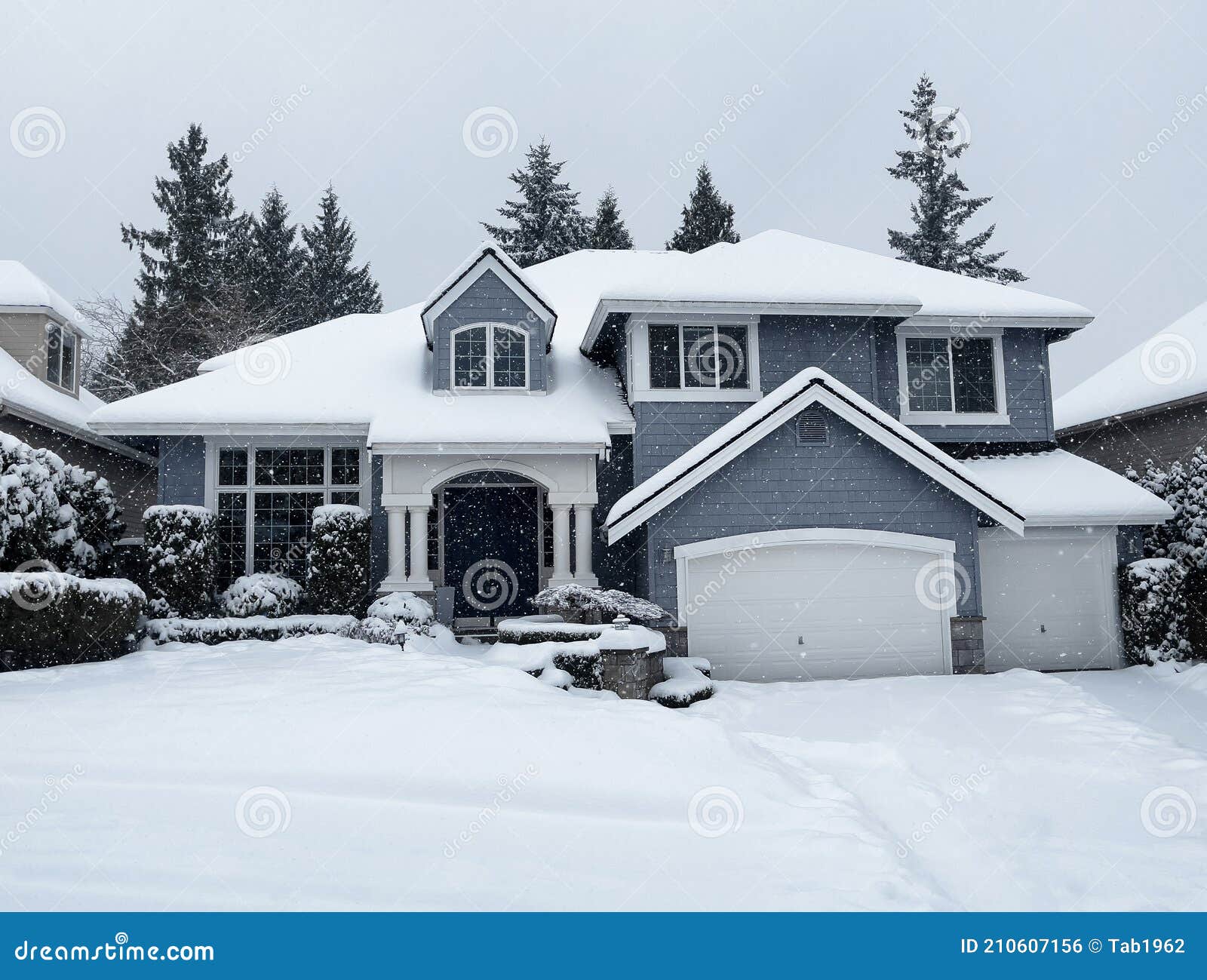 Snow Falling in Front Yard of Suburban Home Stock Photo - Image of ...