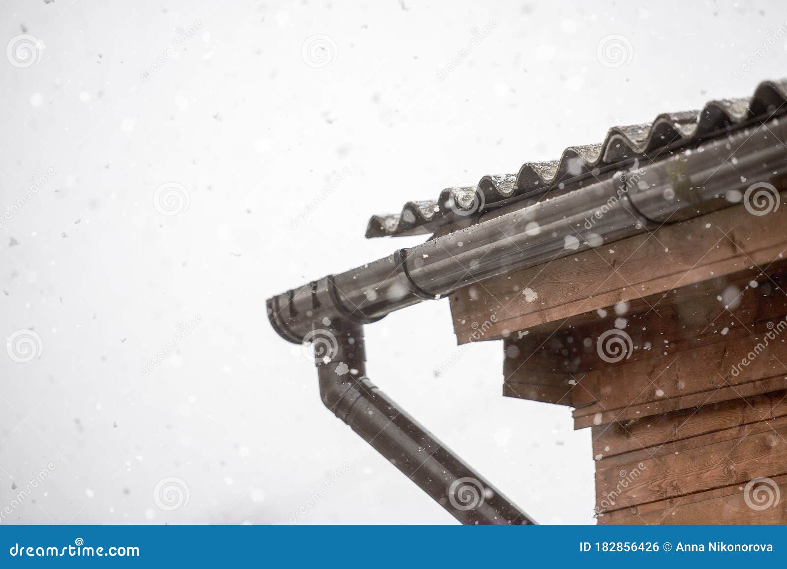 Snow is Falling Over the Roof of the House - a Cold Spring and the ...