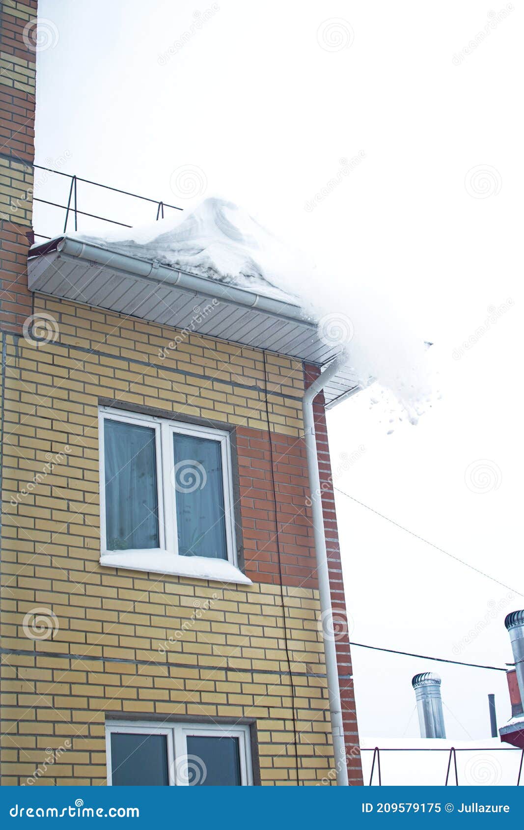 Snow is Falling from the Roof of a Multi-storey Building Stock Image ...