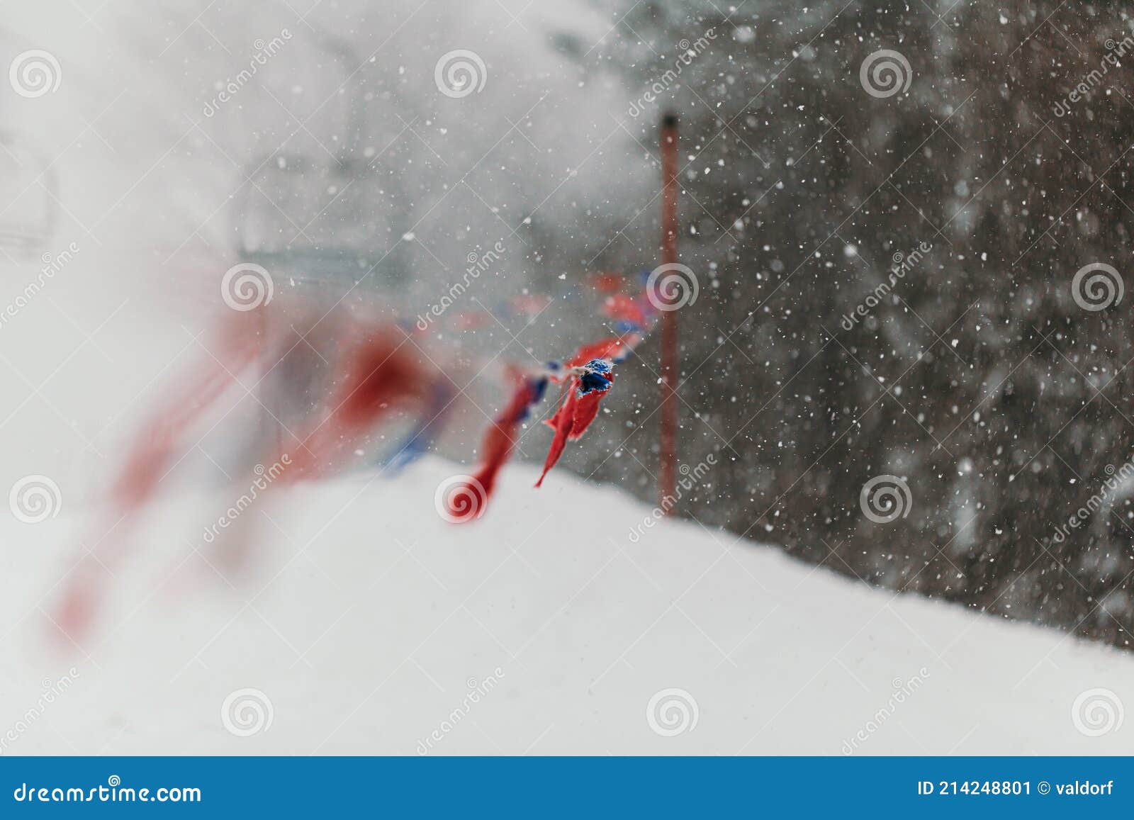 Snow Falling in Winter at Ski Slope Stock Image - Image of flag ...
