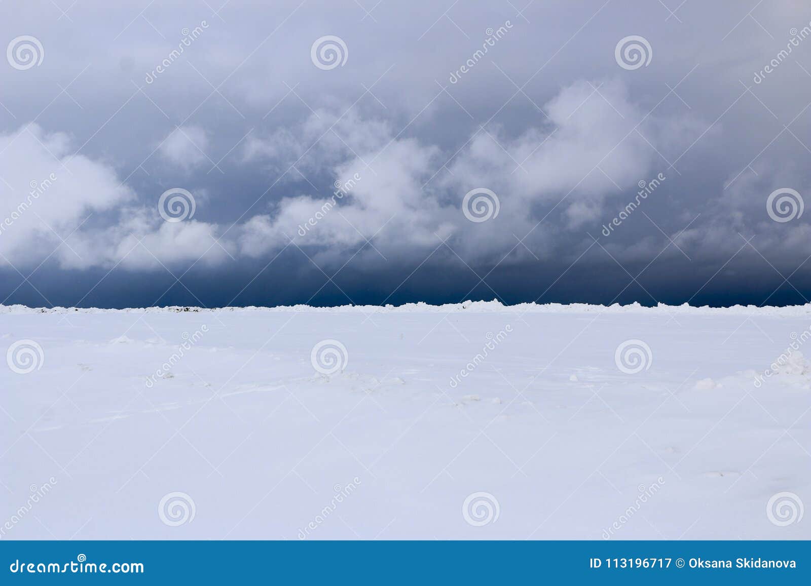 Snow Field. the Plain is Covered with White Snow Under a Blue Sky with ...
