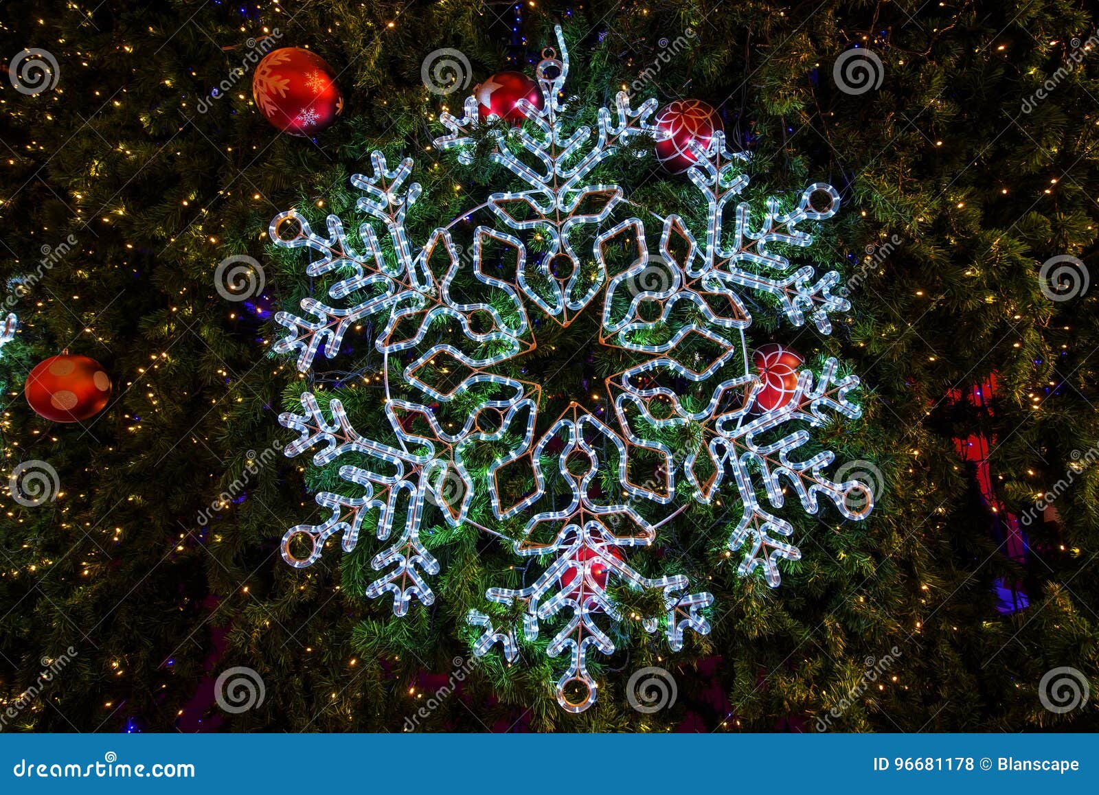Snow Flake on Christmas Tree Stock Photo - Image of shiny, bauble: 96681178