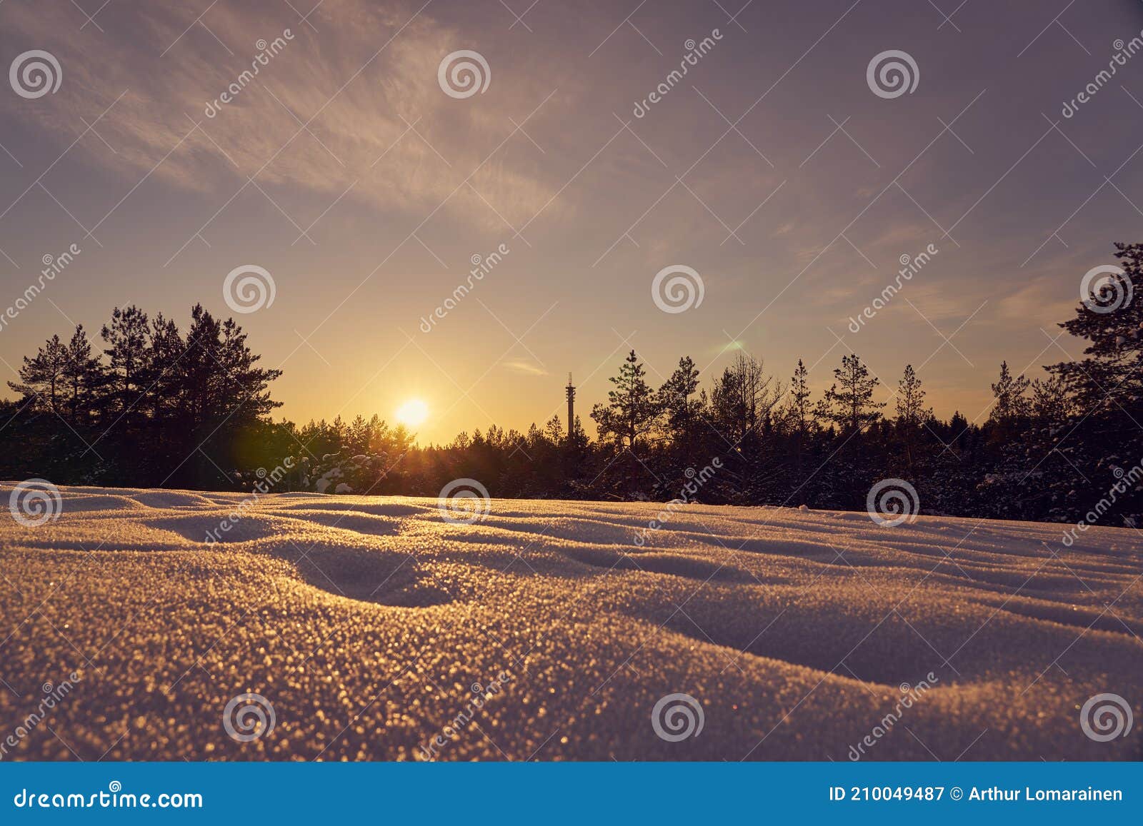 Snow in the Foreground on a Frosty Winter Evening at Sunset As a ...