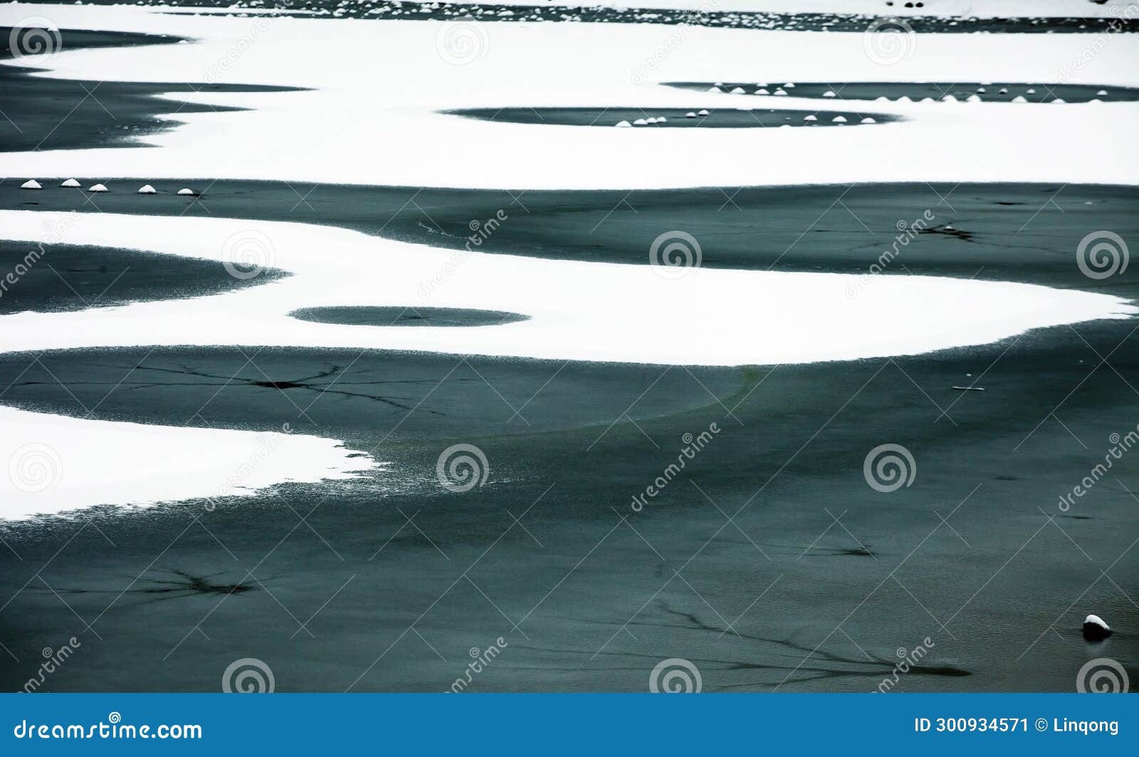 The Snow and Frozen Lake Form a Pattern of Light and Darkness. Stock ...