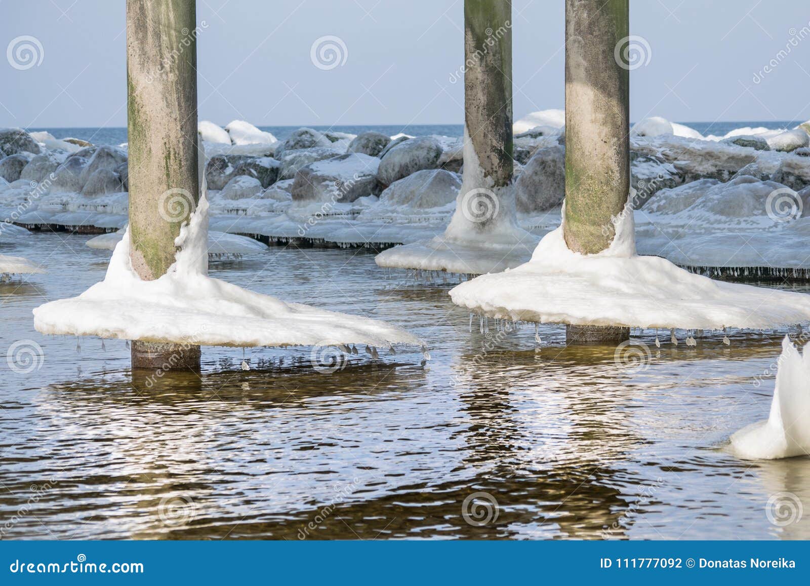 Ice on bridge pole stock photo. Image of dock, white - 111777092