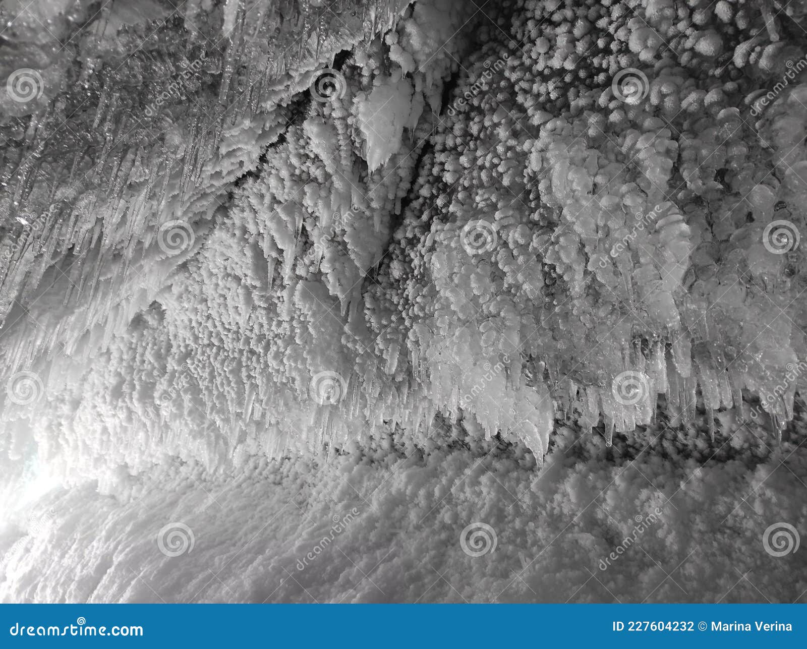 Snow Icicles and Winter Patterns on the Rocks in the Cave Stock Photo ...