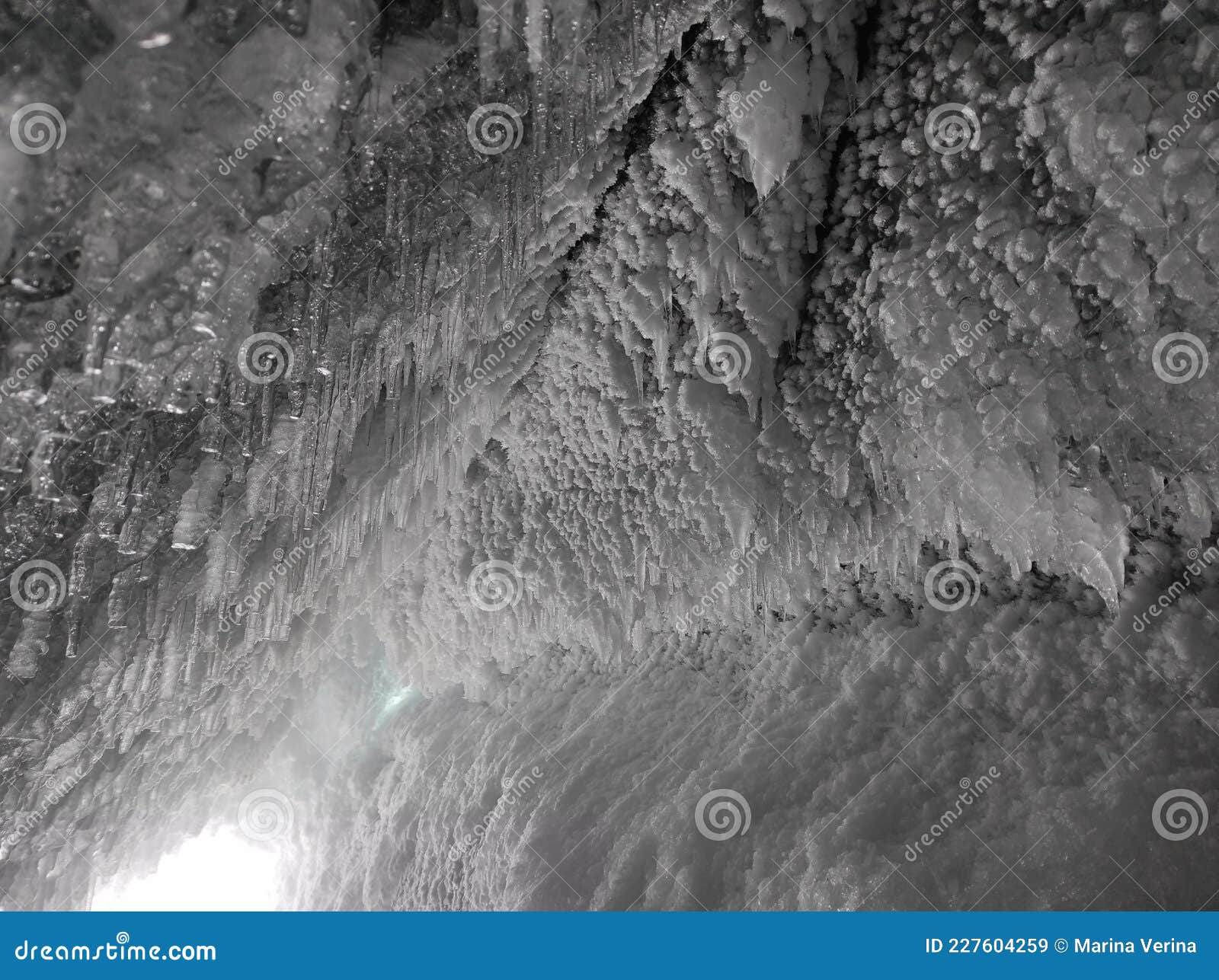 Snow Icicles and Winter Patterns on the Rocks in the Cave Stock Image ...