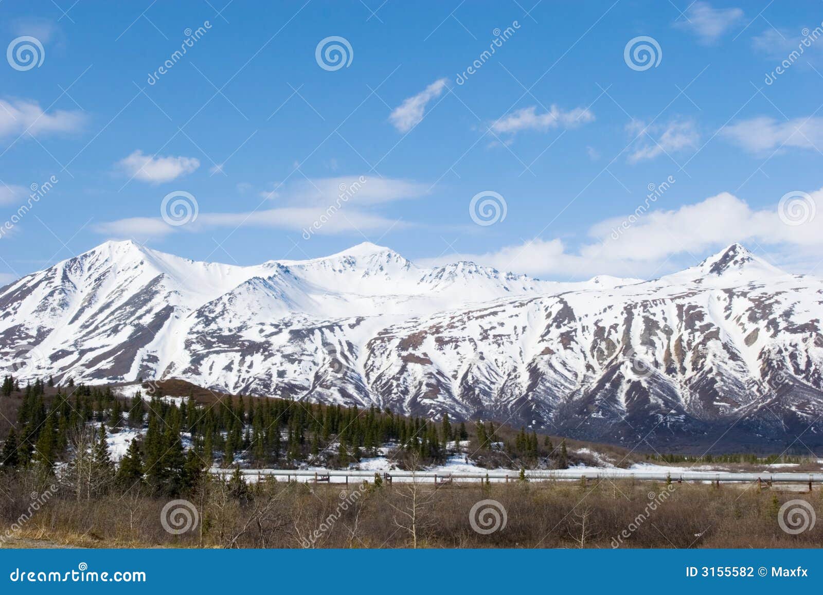 Snow melting on mountains stock photo. Image of alaska - 3155582