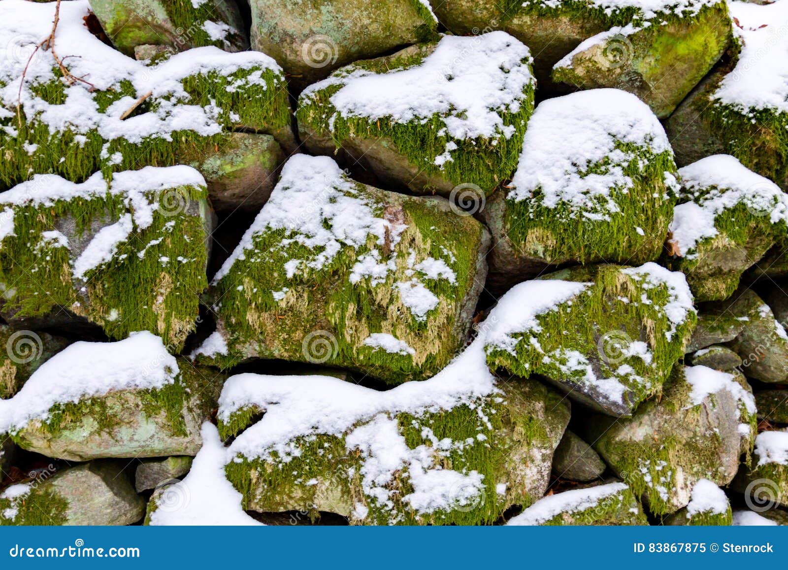 Snow and Moss Covered Rocks Stock Image - Image of packed, stones: 83867875