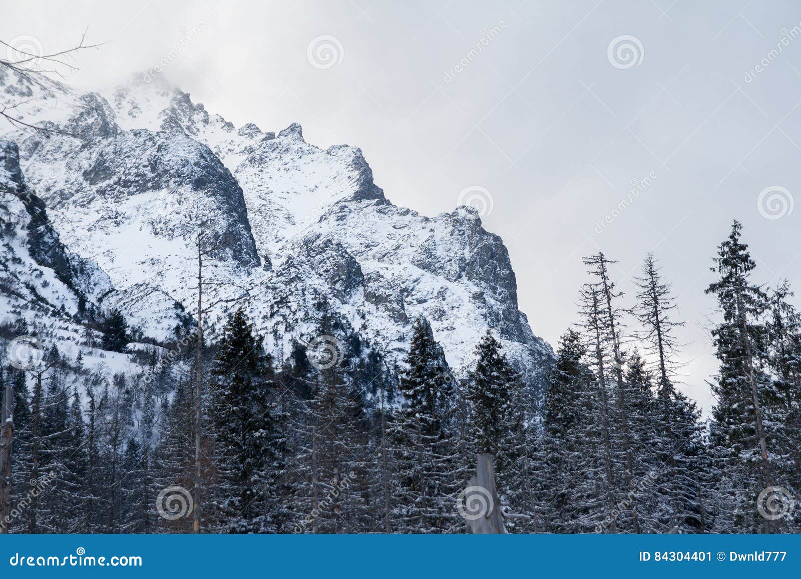 Snow mountain overcast sky stock image. Image of cold - 84304401