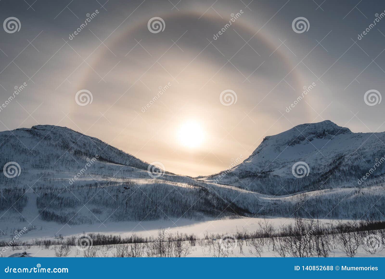 Snow Mountain Range with Sun Halo in Winter Stock Photo - Image of ...