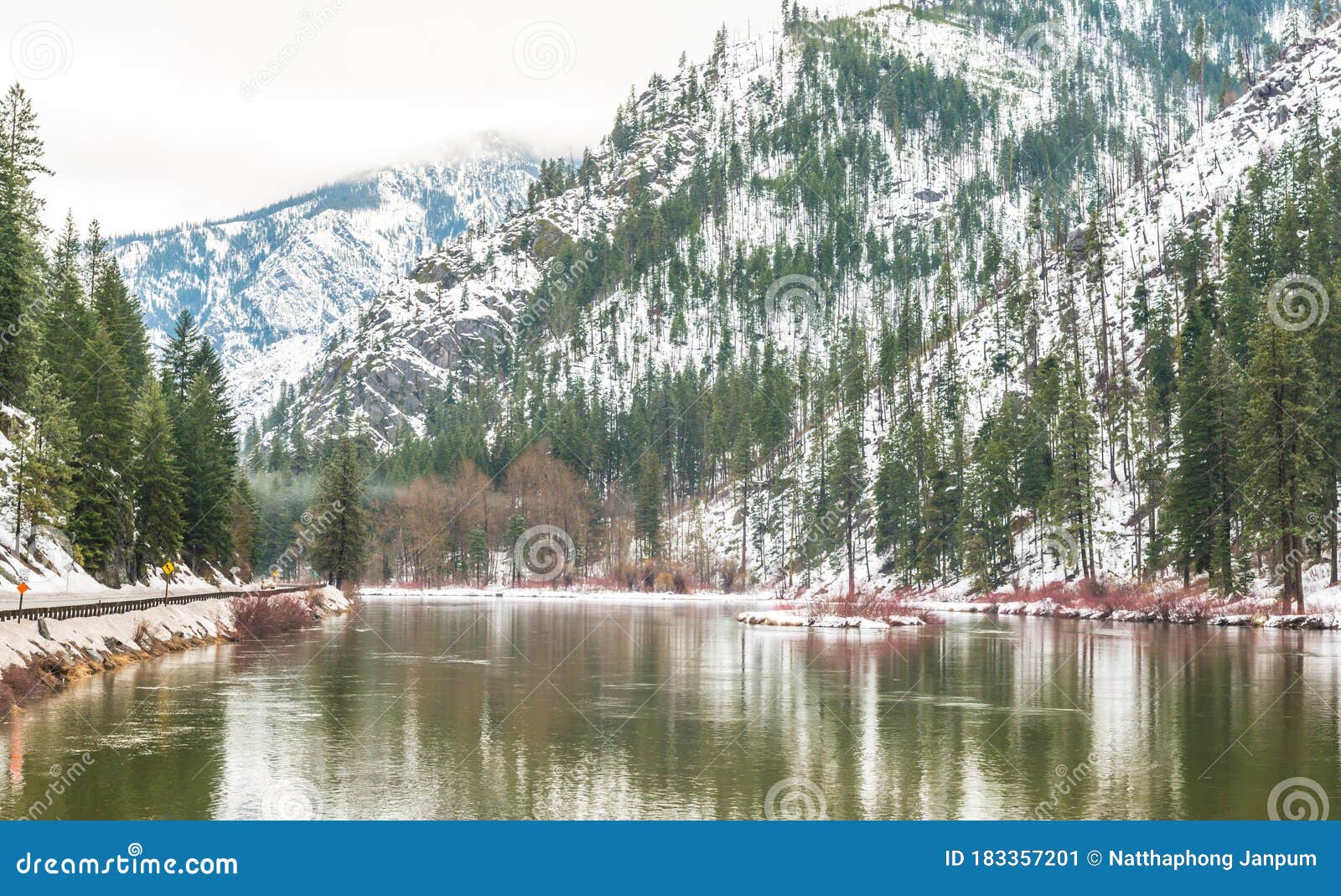The Snow Mountain with Reflection on a Lake in Winter Stock Image ...