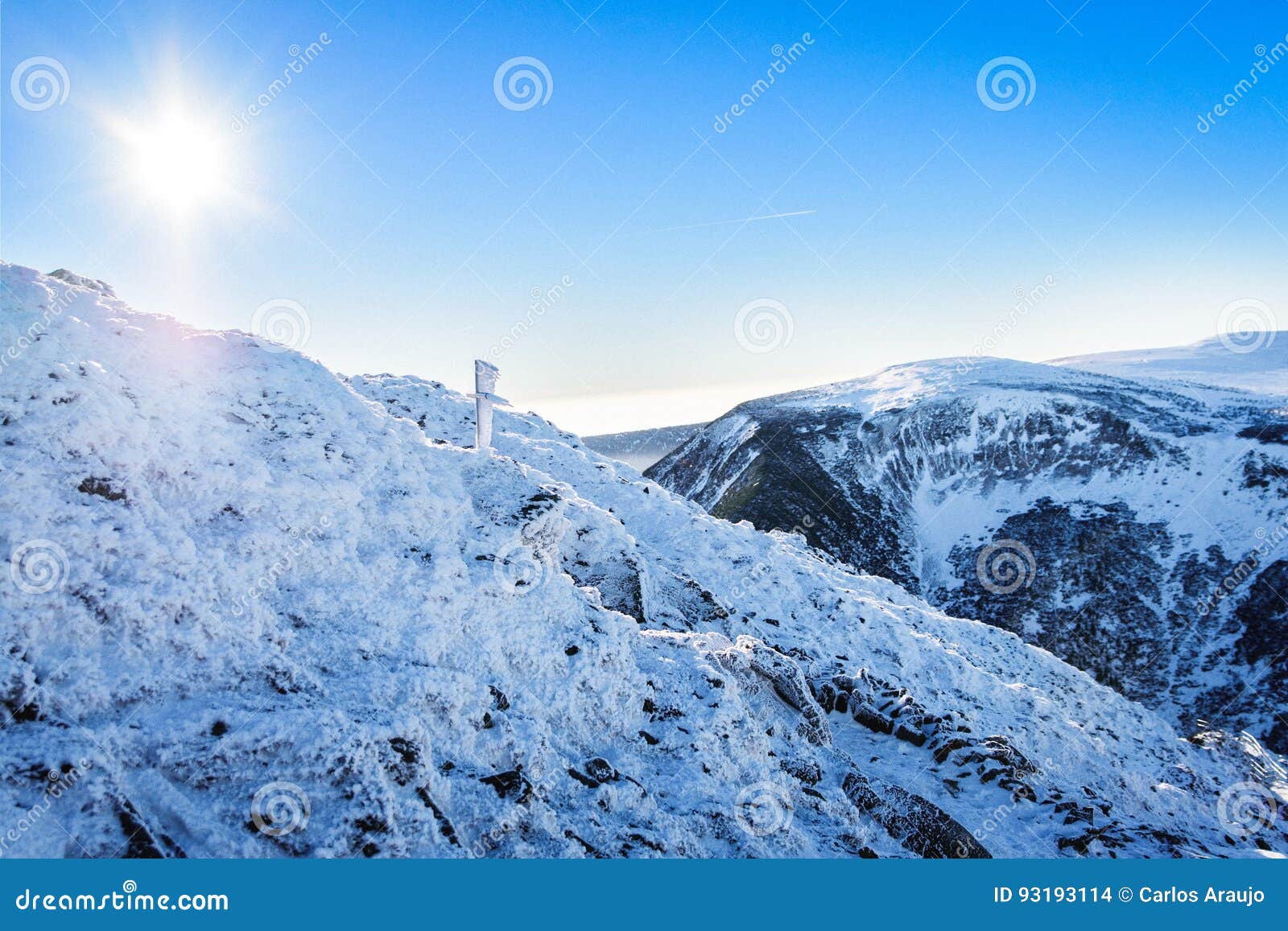Snow at the mountain top stock photo. Image of stone - 93193114