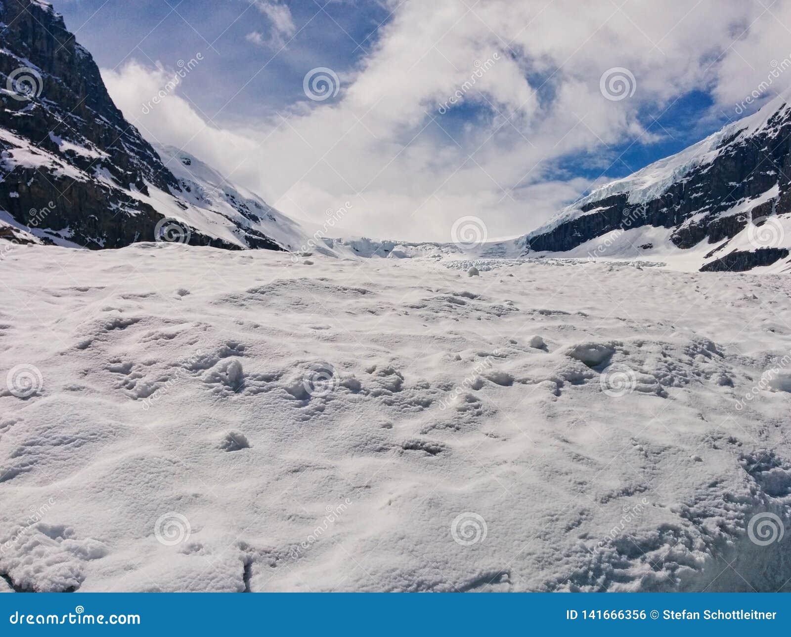 Snow on the mountain top stock photo. Image of nature - 141666356